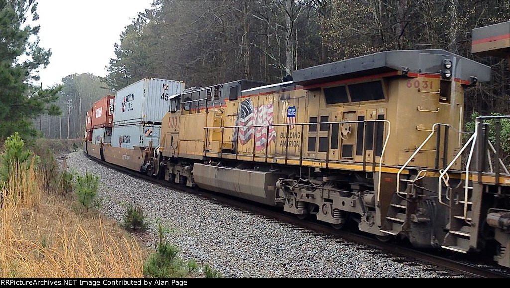 UP 6031 slowly approaches a red signal